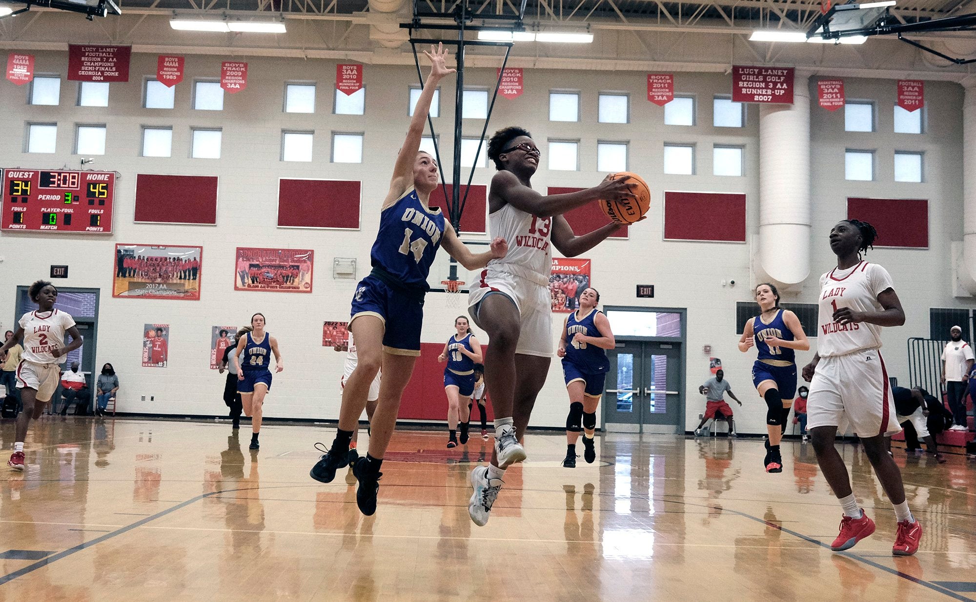 Photojournalism: Laney High School girls' basketball team heads to the ...