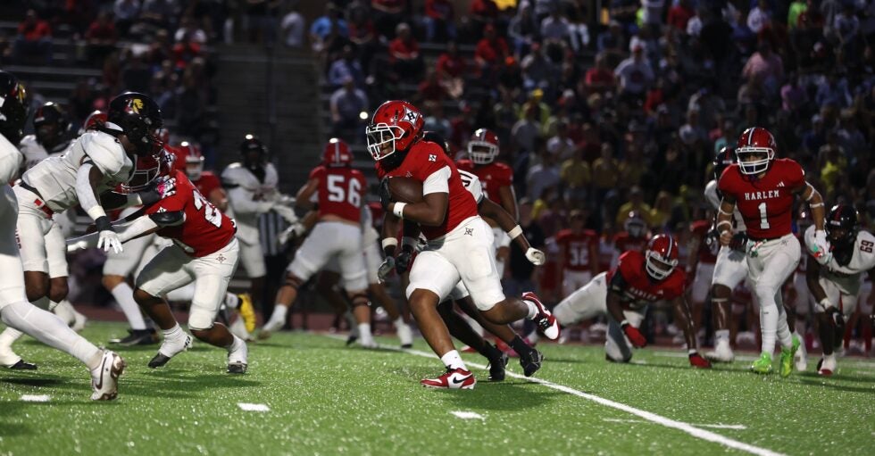 Harlem football's defense stands tall against Baldwin in their Region ...
