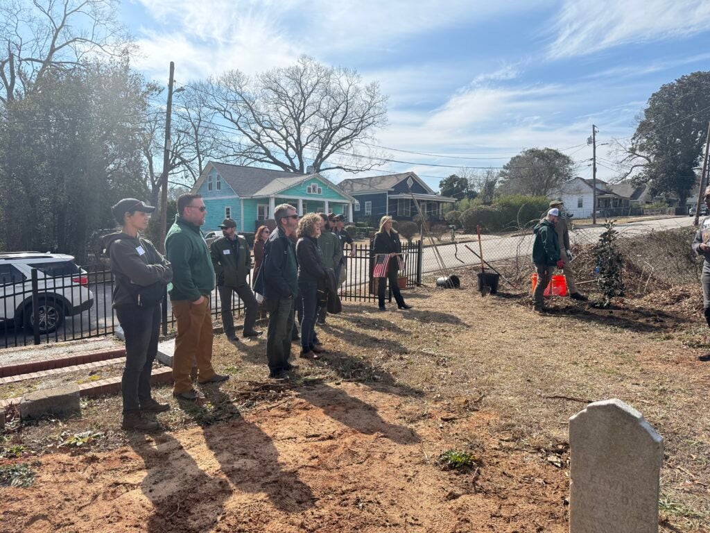 Photostory: Arbor Day event focuses on storm recovery, tree planting in ...